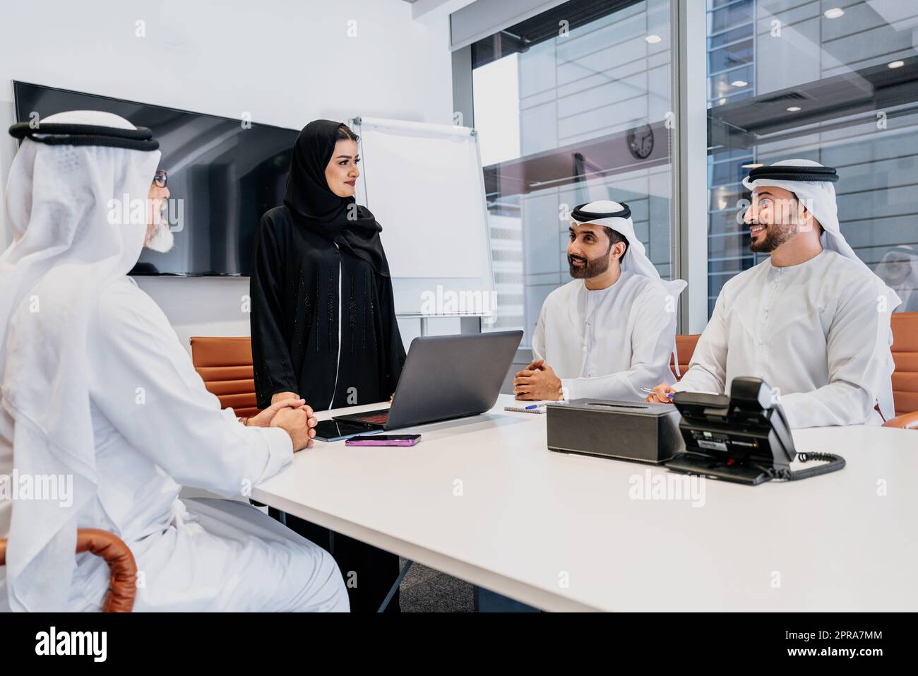 Group of middle-eastern corporate business people wearing traditional ...