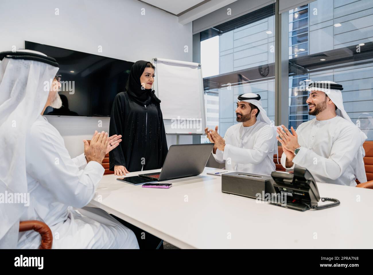 Group of middle-eastern corporate business people wearing traditional ...
