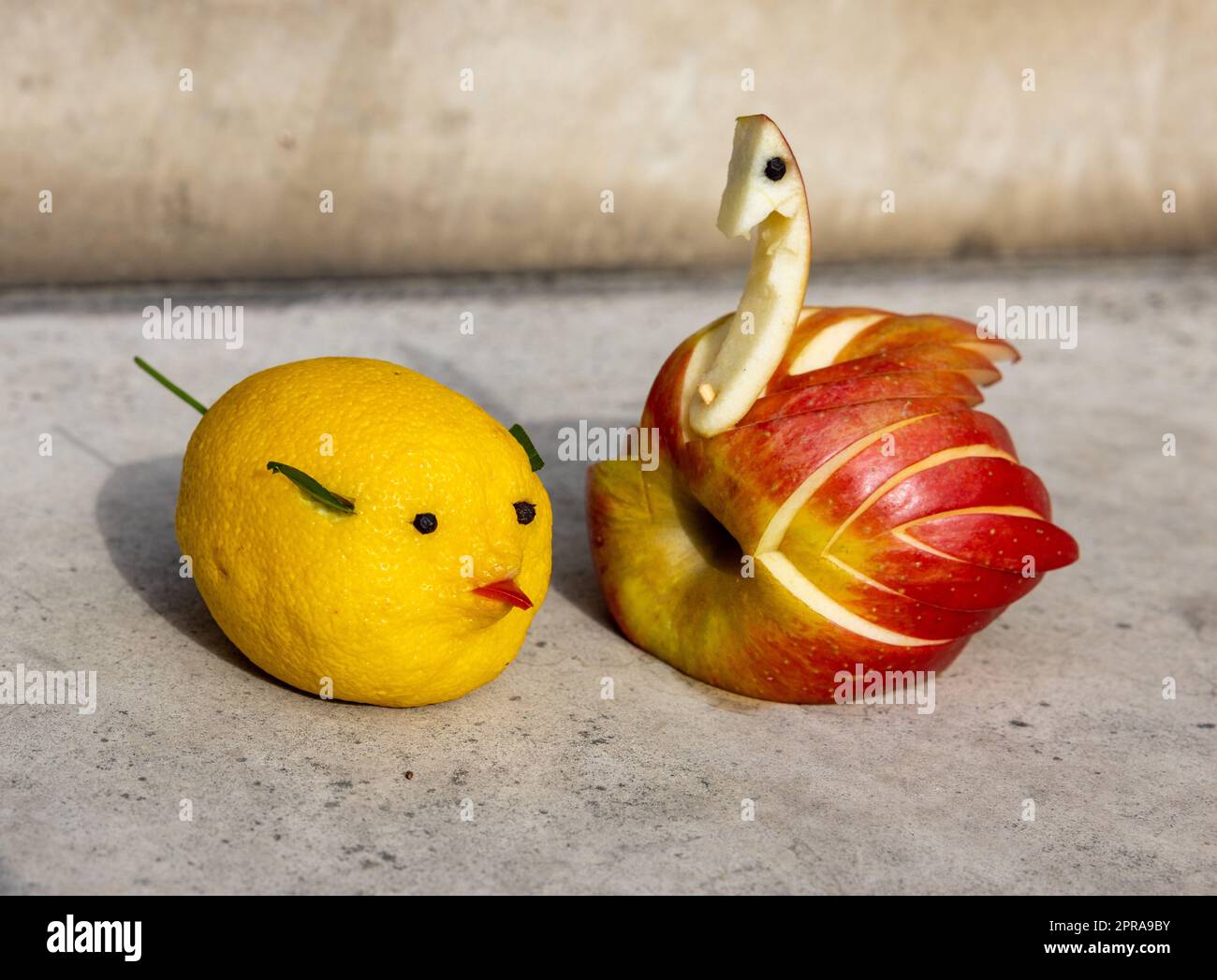 Animal-shaped decorations made of fruits Stock Photo - Alamy