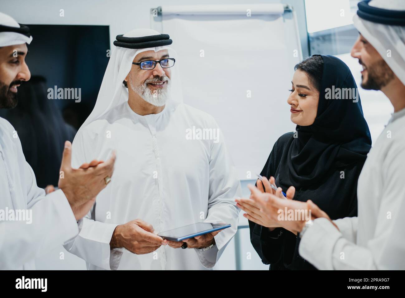 Group of middle-eastern corporate business people wearing traditional ...