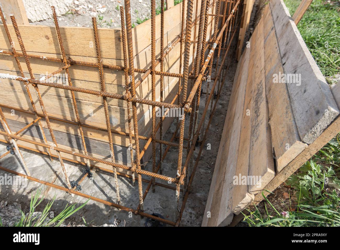 Installation of formwork during the construction of a strip, shallow ...