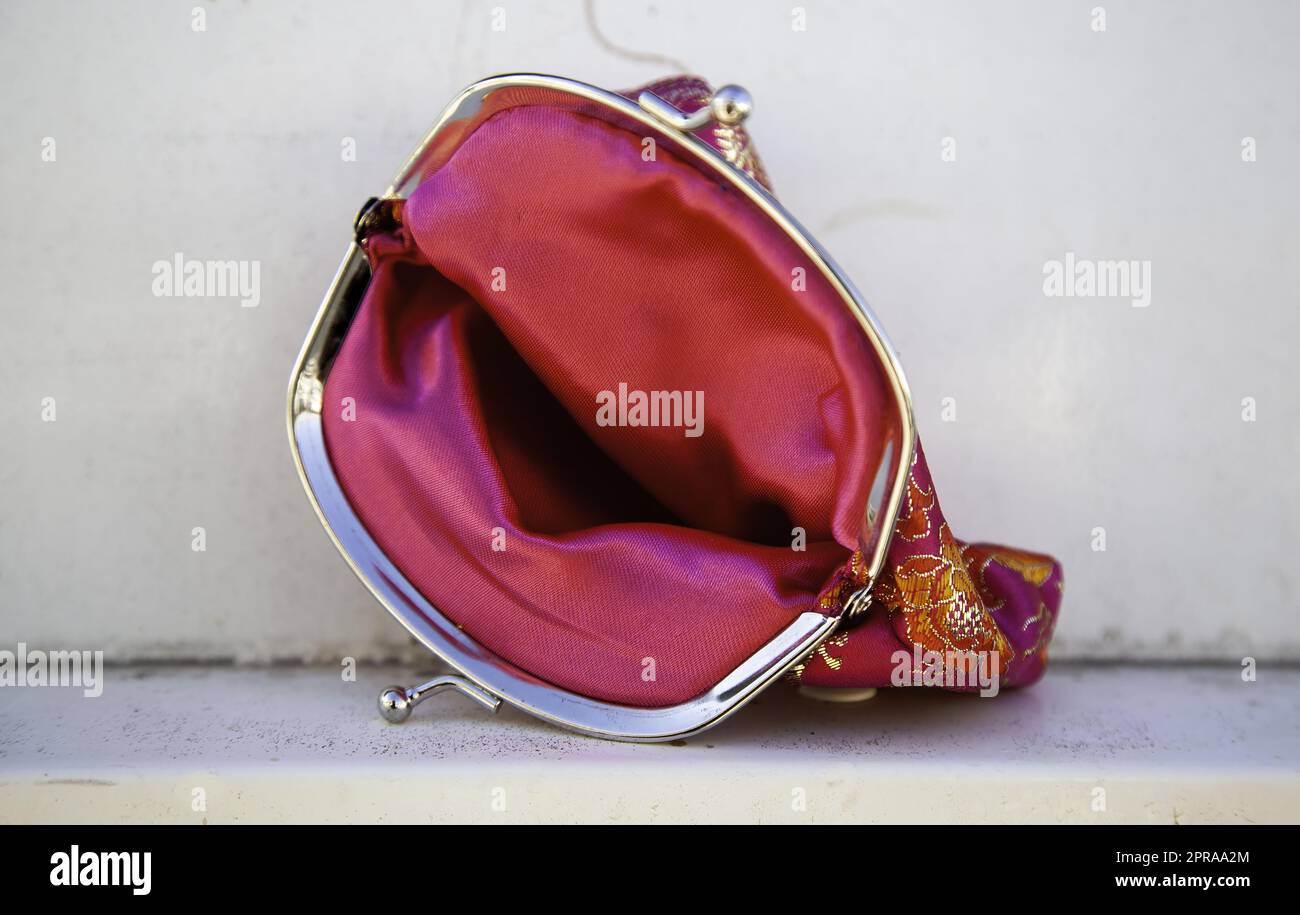 Empty female wallet hi-res stock photography and images - Alamy