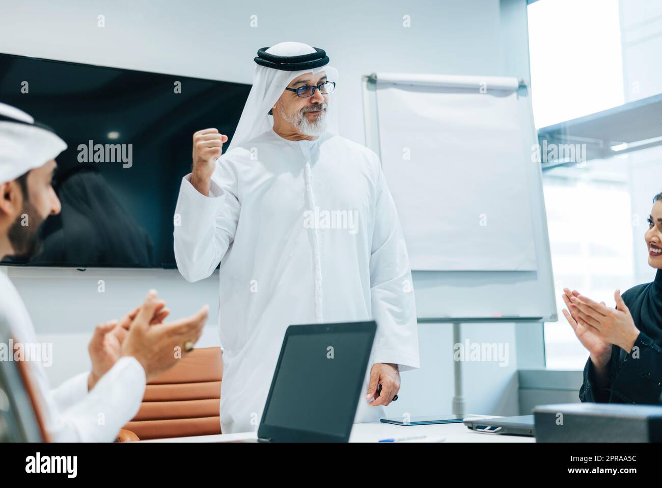 Group of middle-eastern corporate business people wearing traditional ...
