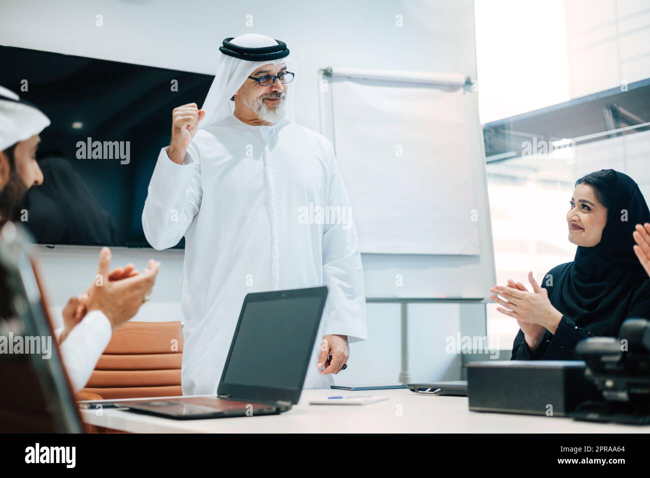 Group of middle-eastern corporate business people wearing traditional ...