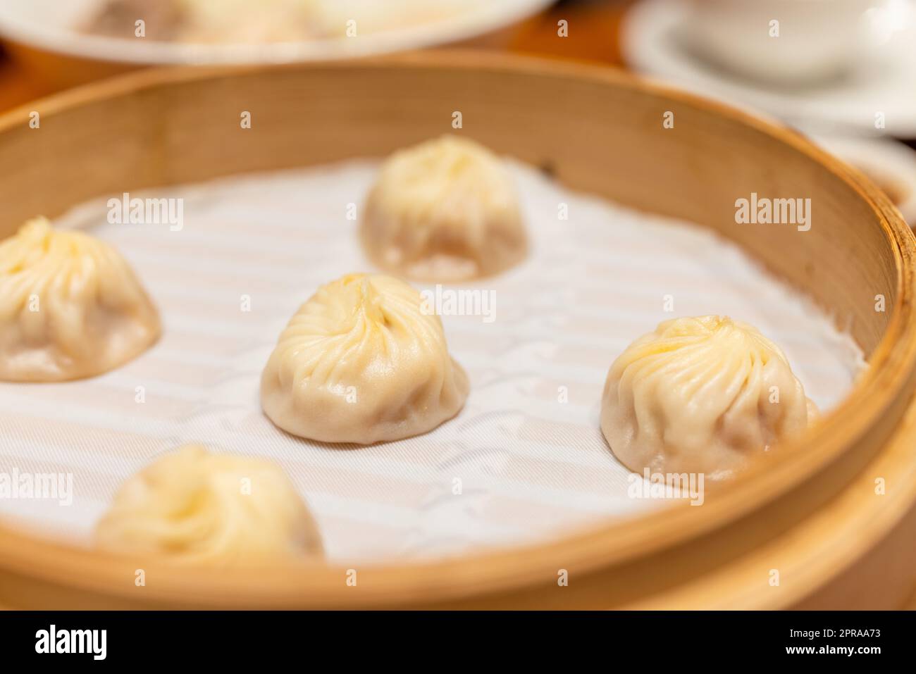 Taiwan cuisine steamed soup bun in basket Stock Photo - Alamy