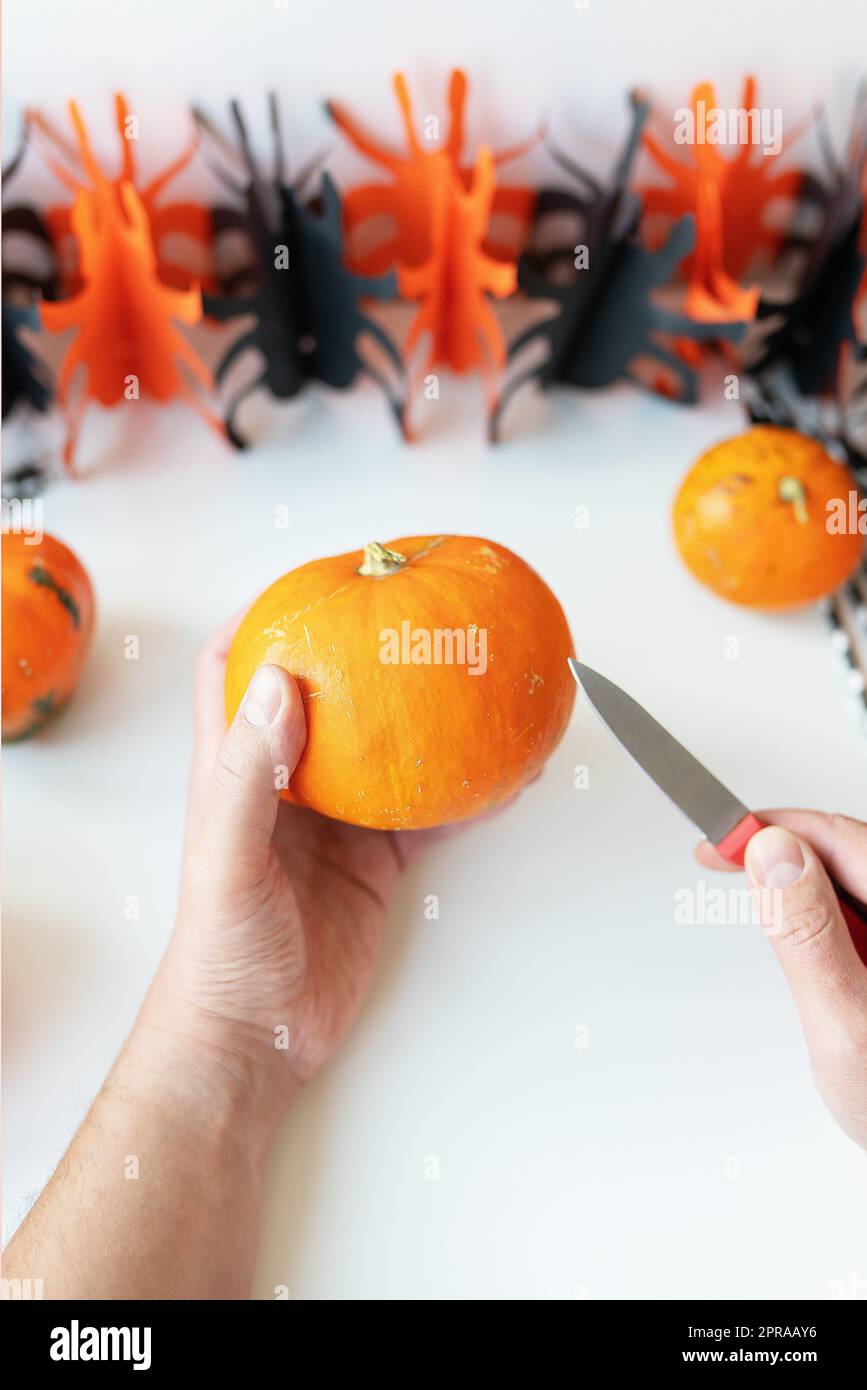 Halloween October 31st. The step-by-step process of carving a pumpkin ...
