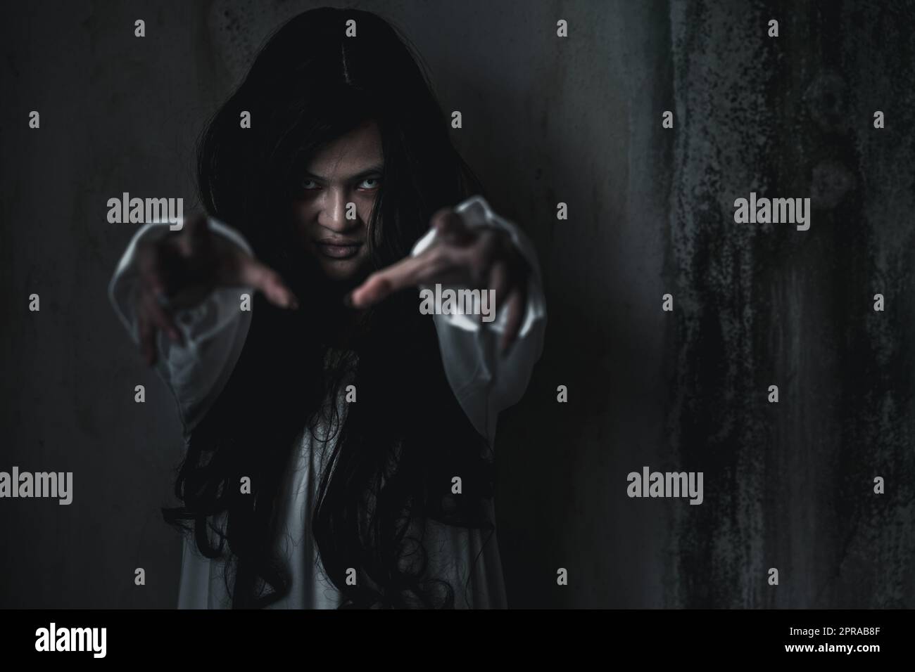 Asian ghost or zombie horror creepy scary have hair covering face and ...