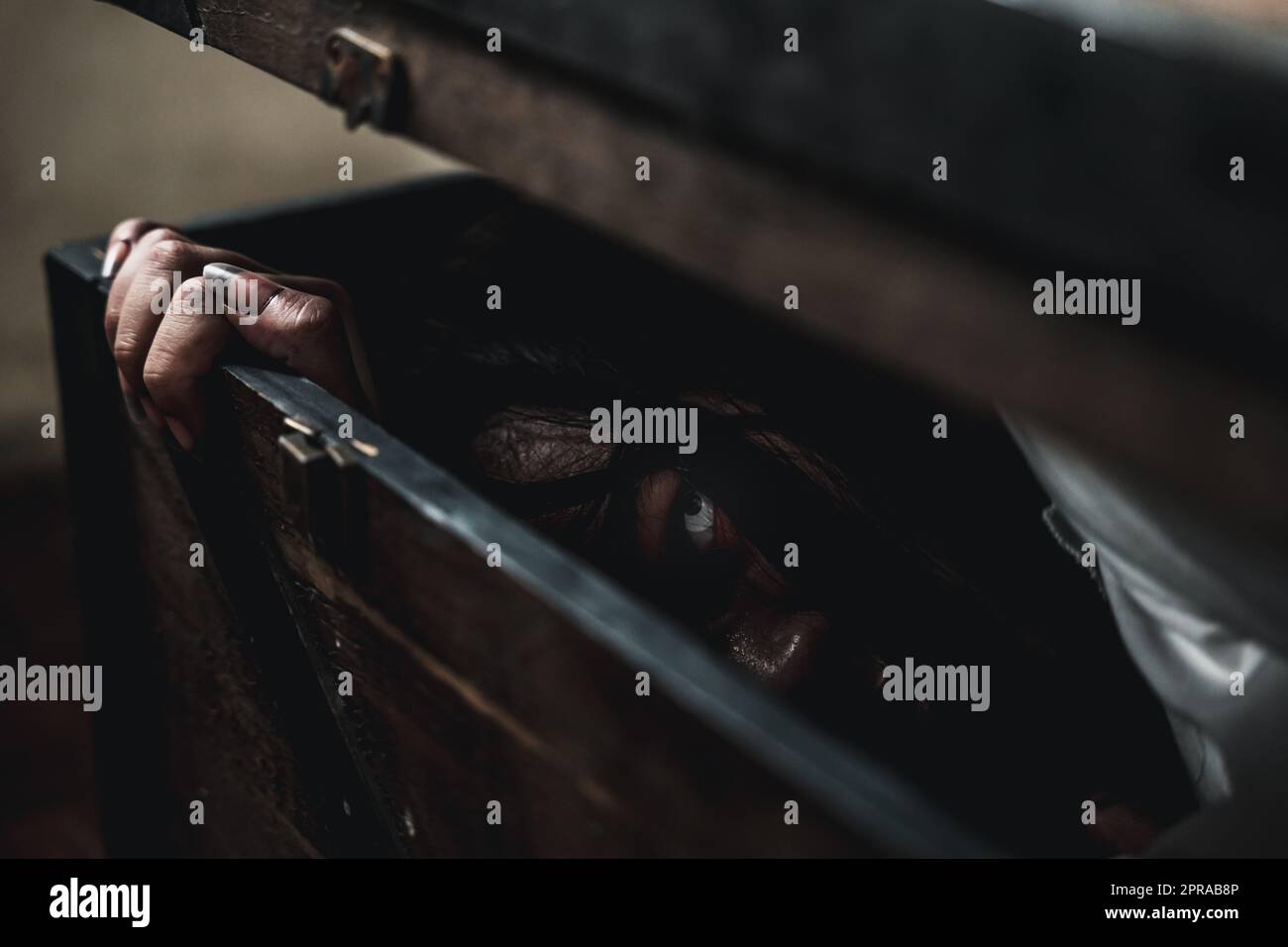 Asian ghost horror creepy scary hair covering face and eye lying in the ...