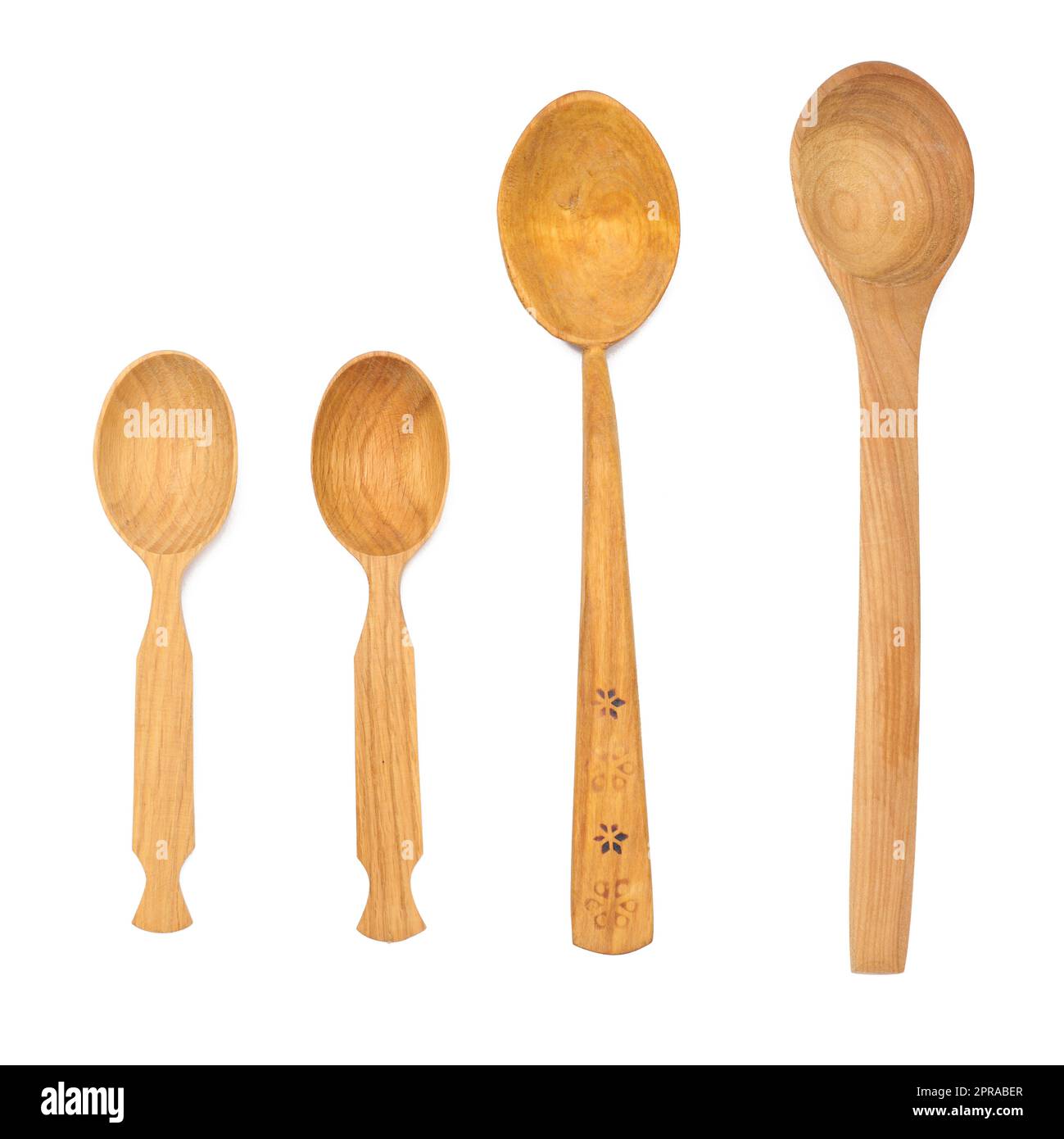 Empty wooden old vintage spoons with long handle isolated on white ...