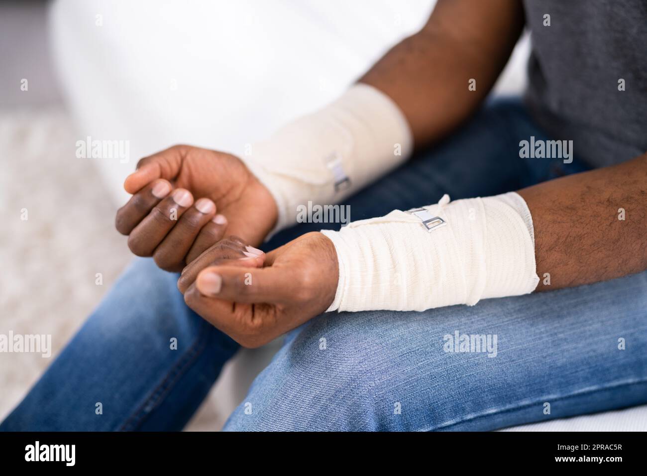 Bandaged Wrists After Cutting Veins Stock Photo - Alamy