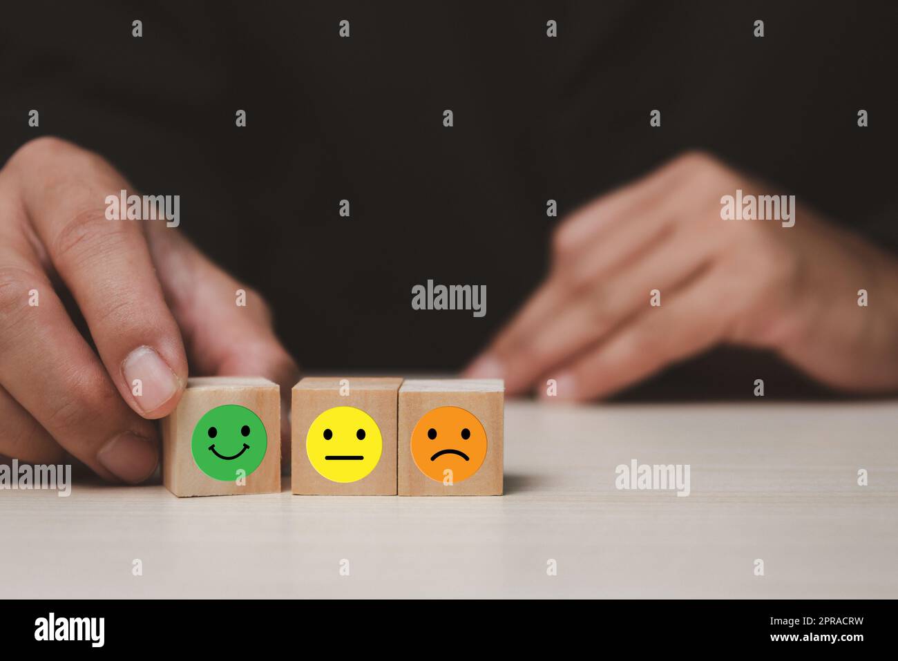 Man hand wood cube block emotion service and customer review feedback ...