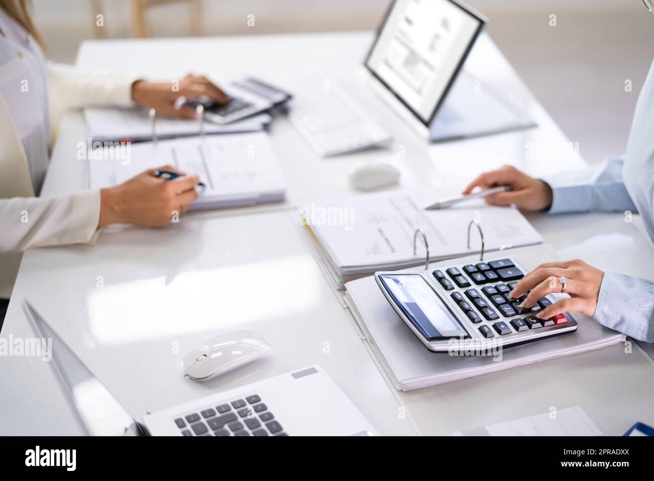 Chartered Tax Accountant Calculating Invoice Stock Photo - Alamy