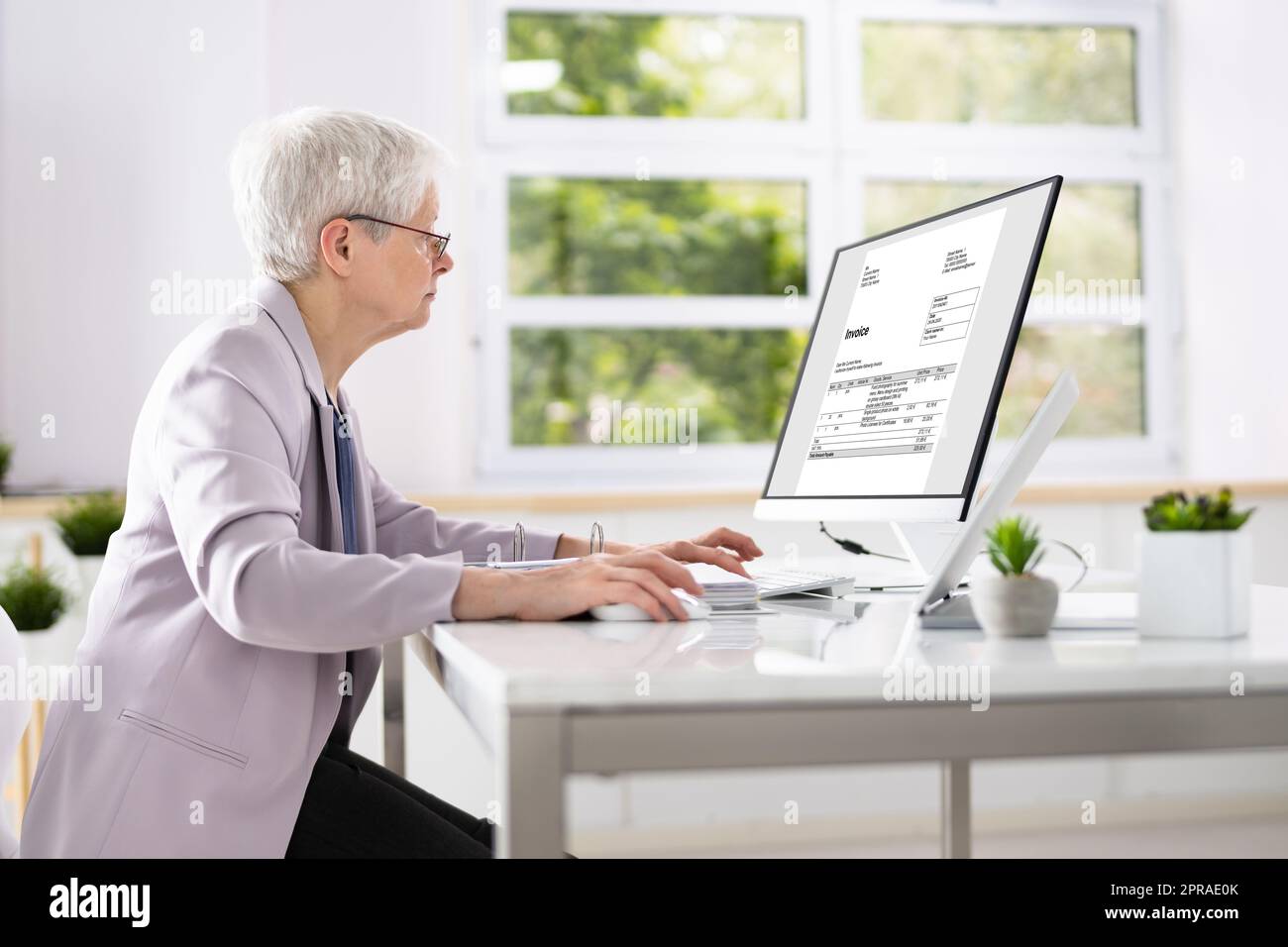 Professional female accountant using hi-res stock photography and ...