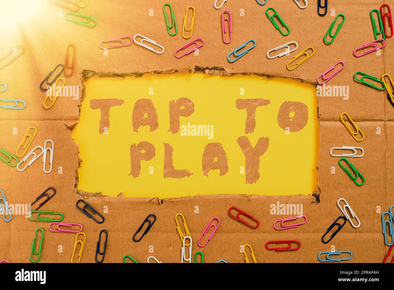 Hand writing sign Tap To Play. Word for Touch the screen to start ...