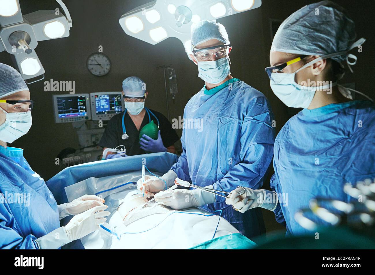 Doctors save lives. surgeons in an operating room Stock Photo - Alamy