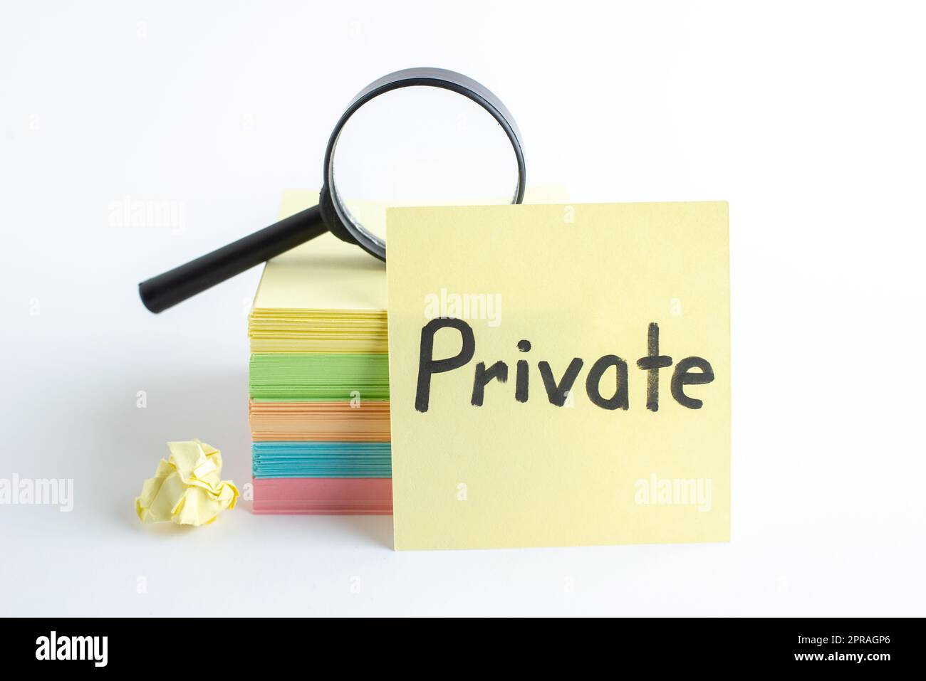 front view colorful paper stickers with private written note on white ...