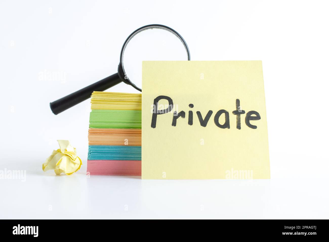 front view colorful paper stickers with private written note on white ...