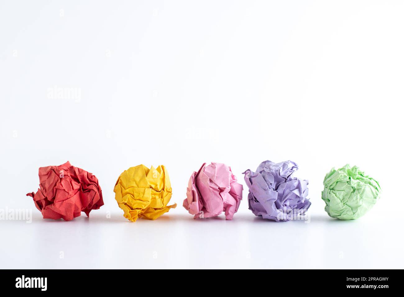 front view colorful squeezed papers on white background job company ...