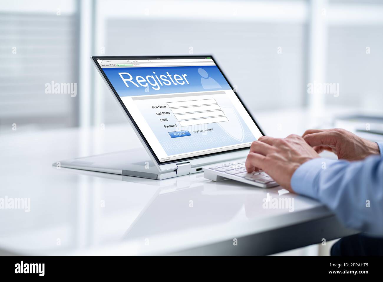 Businessman's Hand Filing Online Registration Form Stock Photo - Alamy