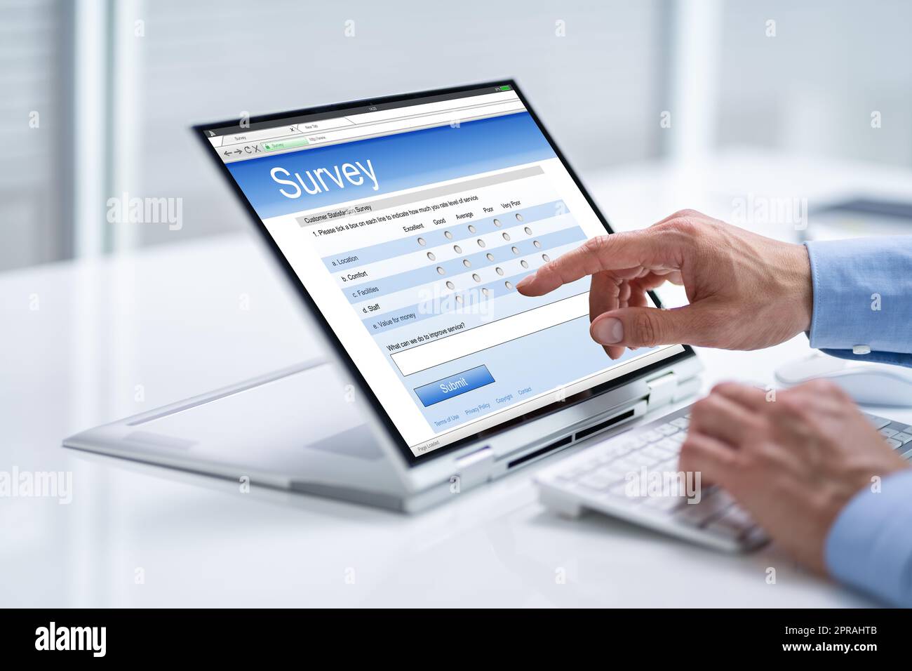 Businessperson Filling Online Survey Form Stock Photo - Alamy