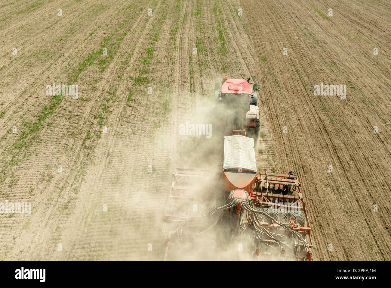 Aerial View. Tractor With Seed Drill Machine Sowing The Seeds For Crops ...