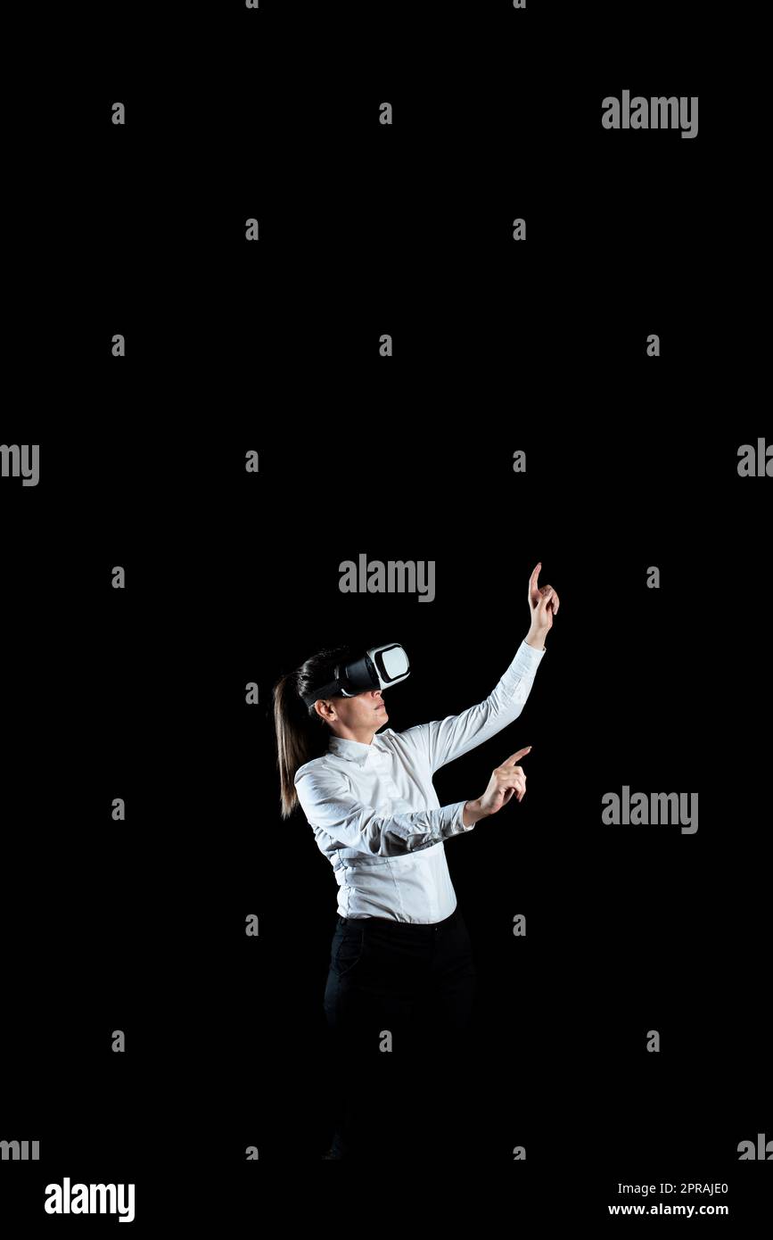 Businesswoman Wearing Virtual Reality Headset And Gesturing While ...
