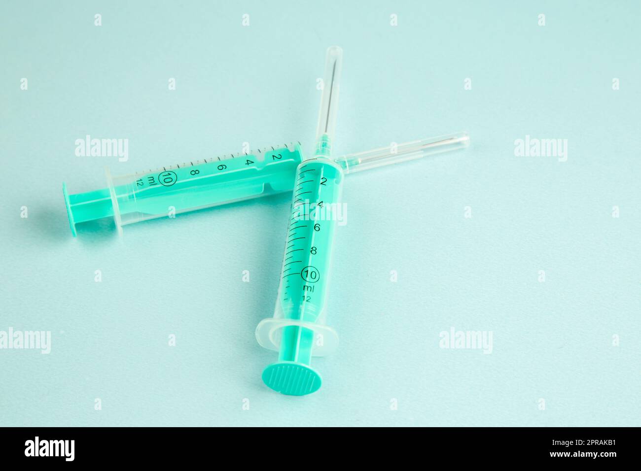 front view green injections on blue background virus health hospital ...