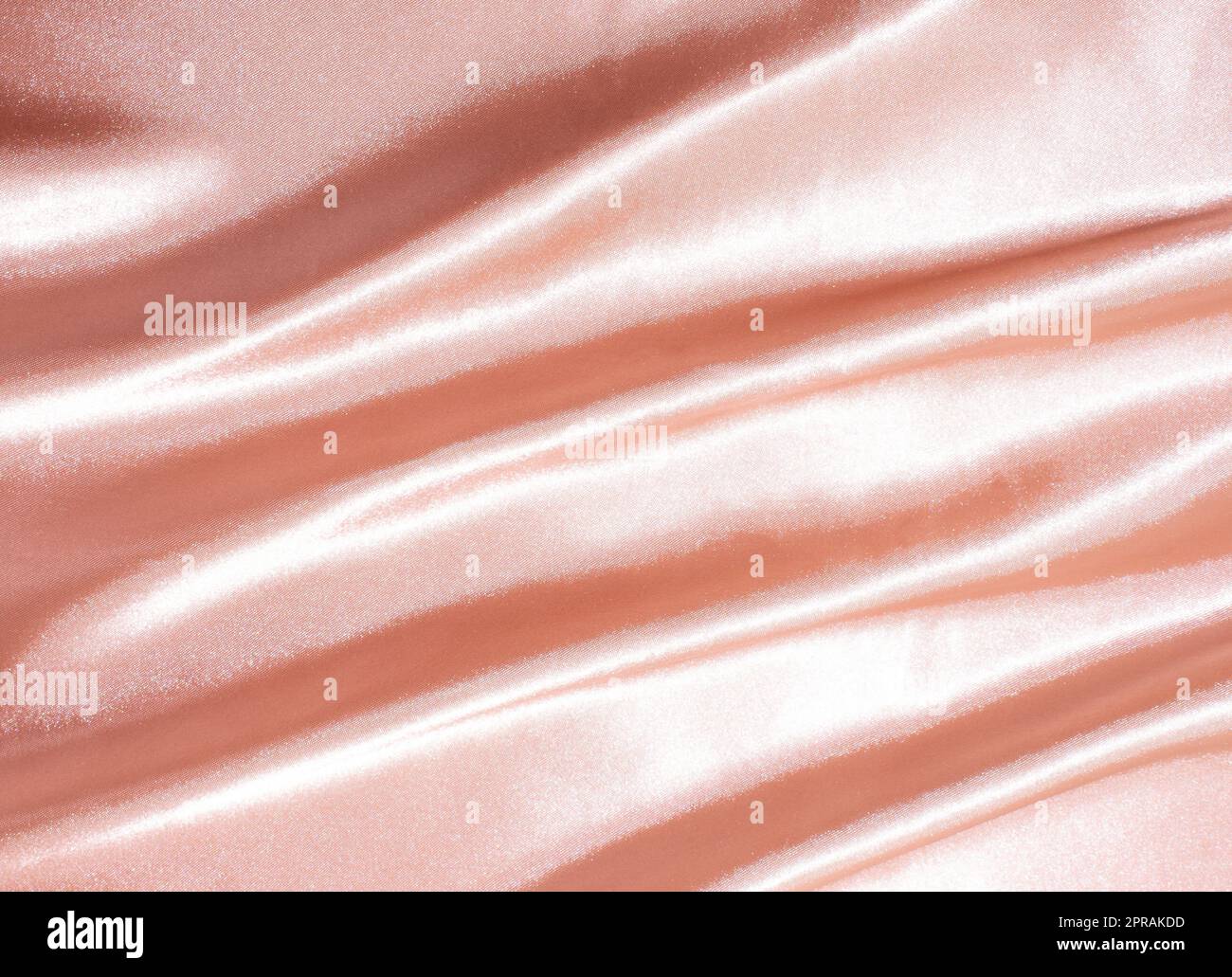 Smooth elegant golden rose silk or satin luxury cloth texture can use ...