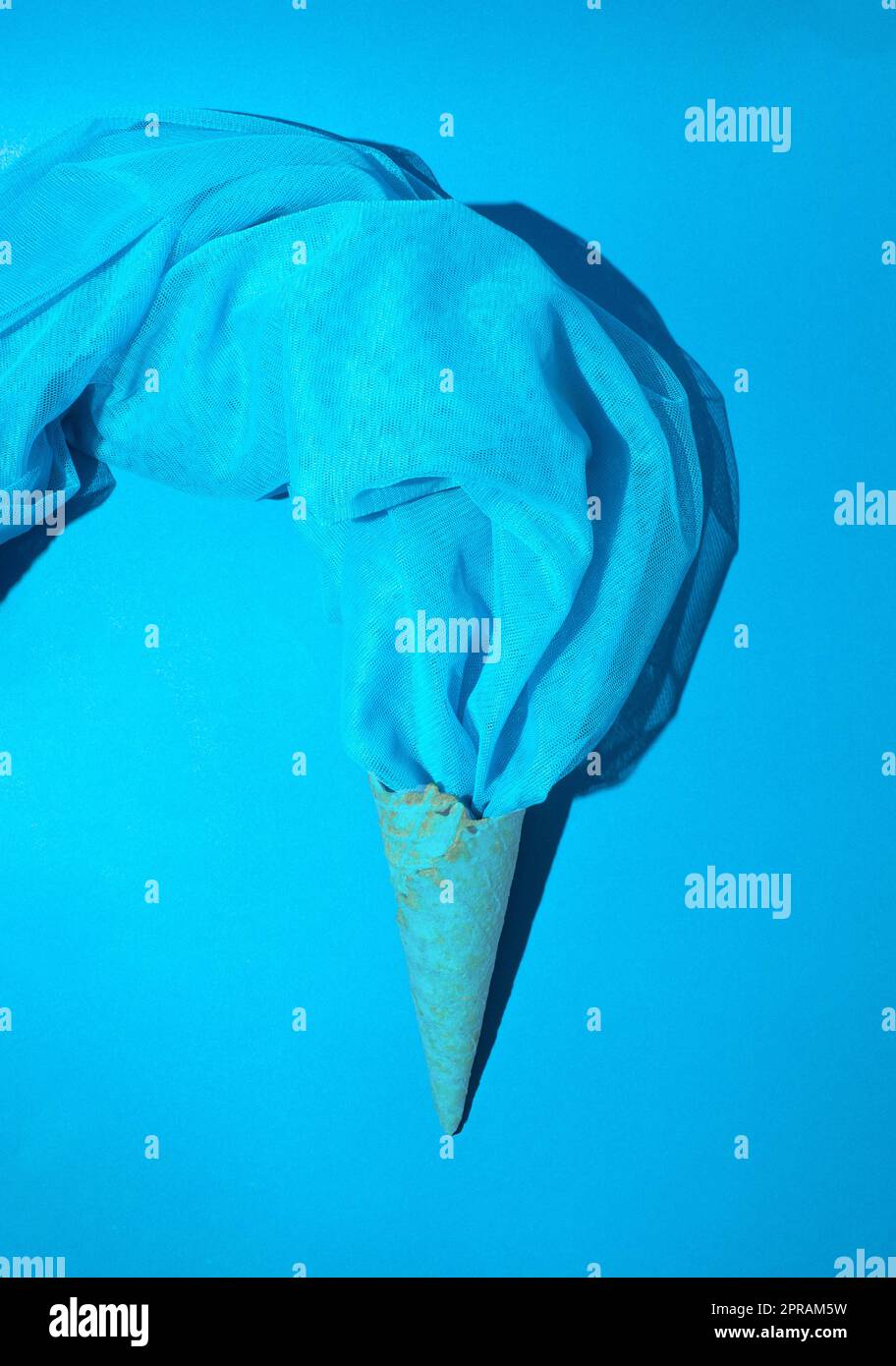 Vintage style concept with ice cream cones and blue mesh fabric ...