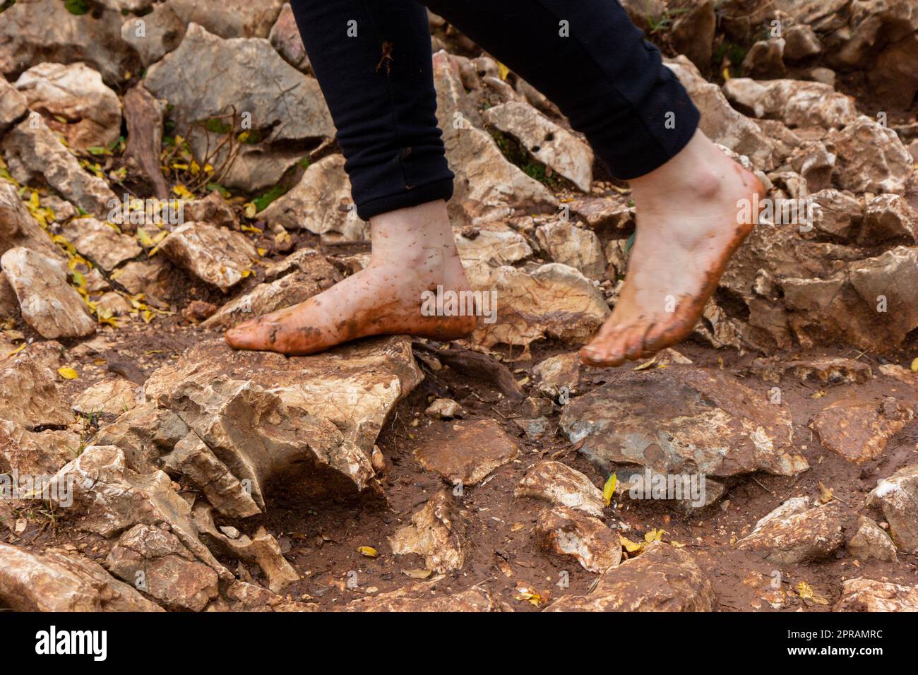 A pilgrim walking barefoot on Mount Podbrdo (Apparition Hill) in ...