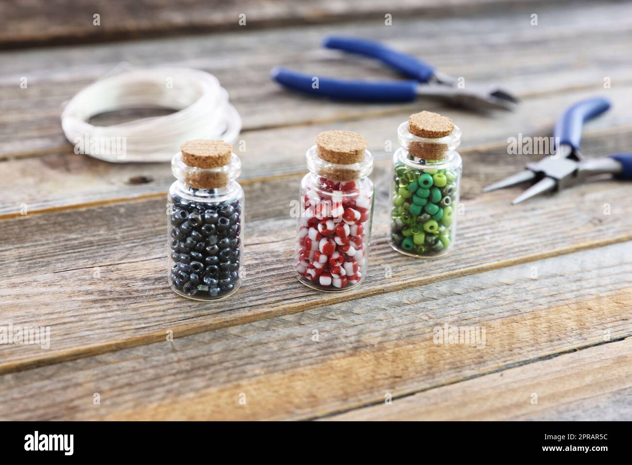 Seed Beads and Small Jars Stock Photo - Alamy
