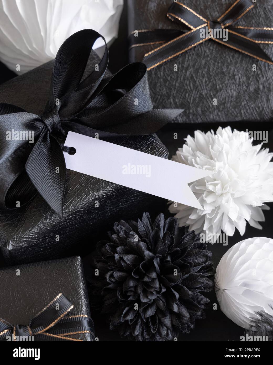 Gift Boxes with Black and white paper flowers and decorations ...