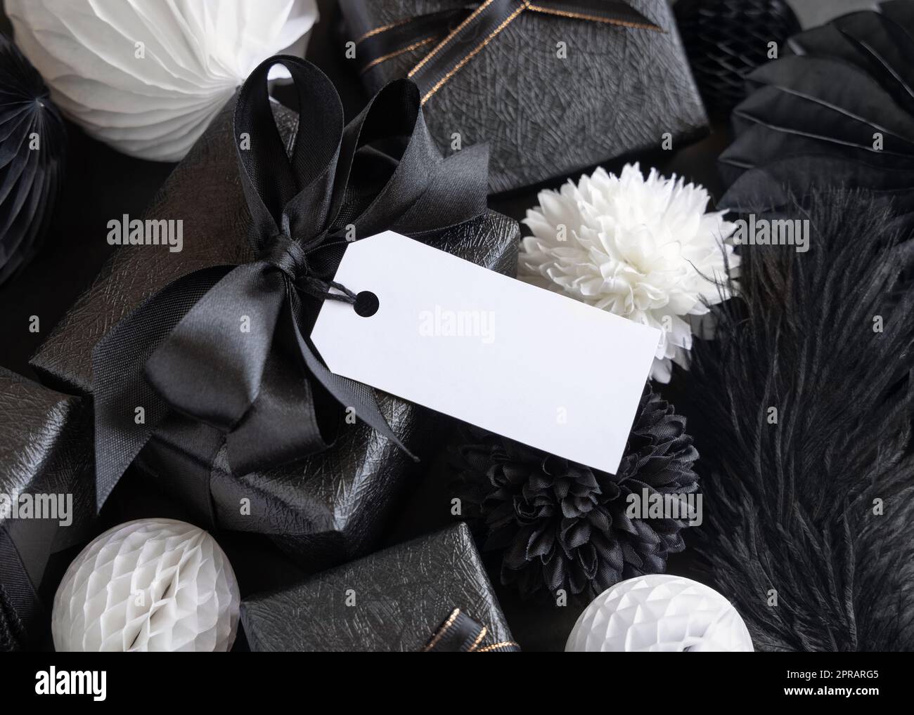 Gift Boxes with Black and white paper flowers and decorations ...