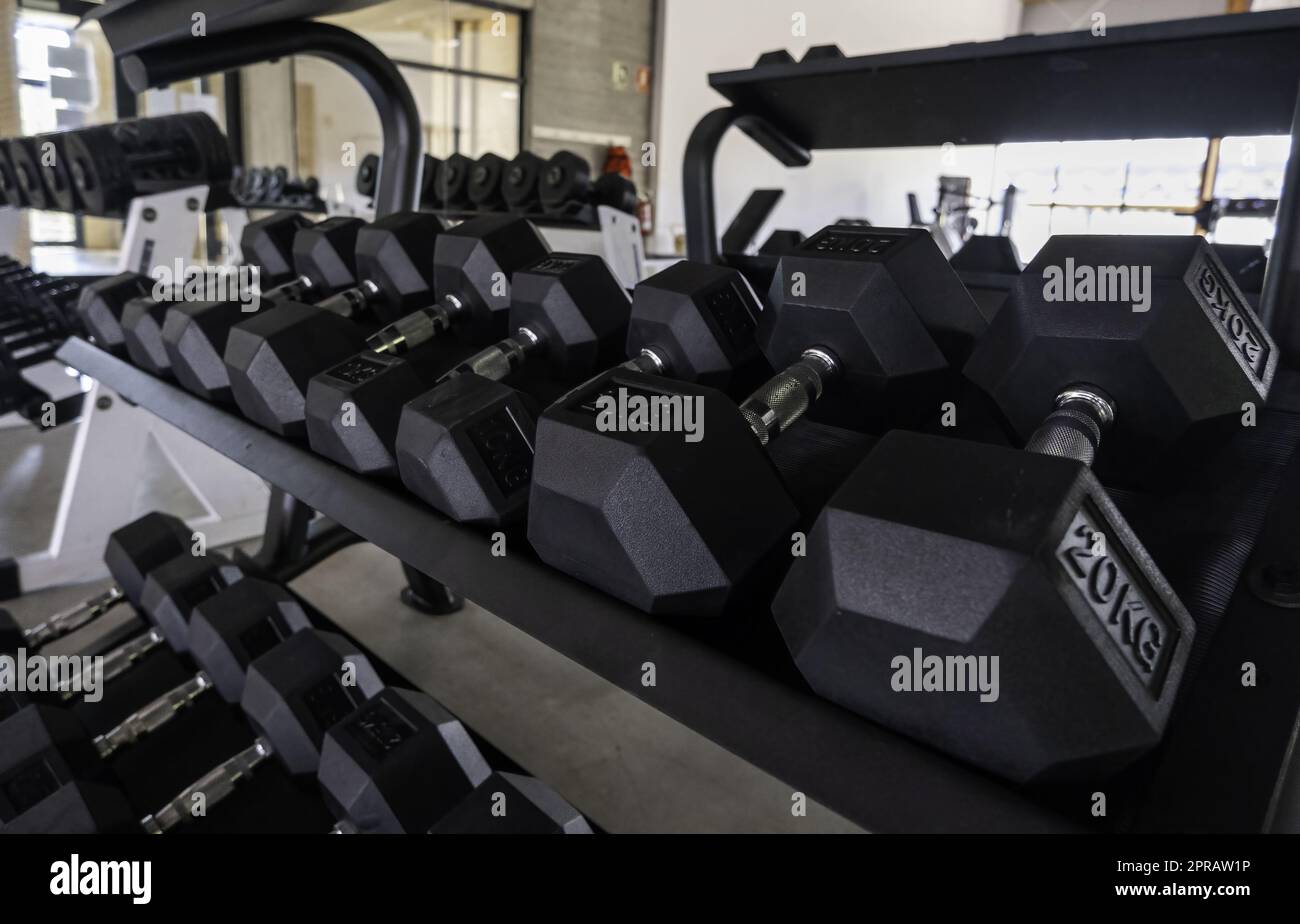 Weights in a gym Stock Photo - Alamy