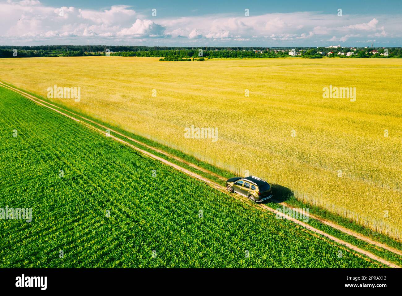 Aerial View Of Car SUV Parked Near Countryside Road In Spring Field ...
