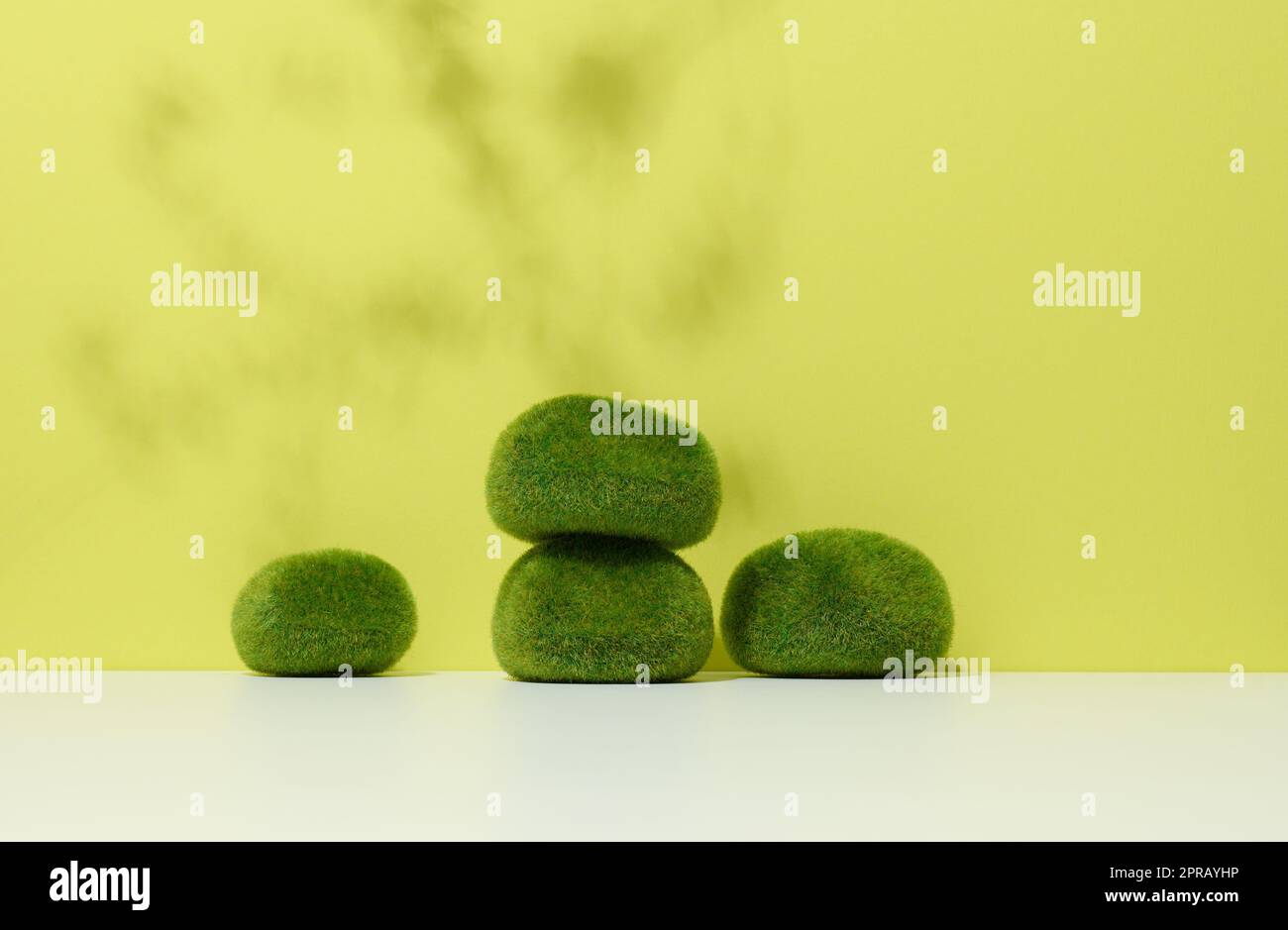 Green pieces of moss and a stage for the demonstration of products ...