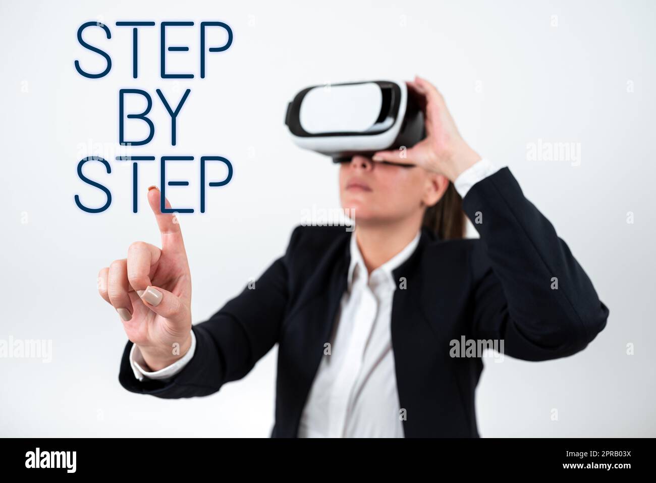 Finger pointing to road sign hi-res stock photography and images - Alamy