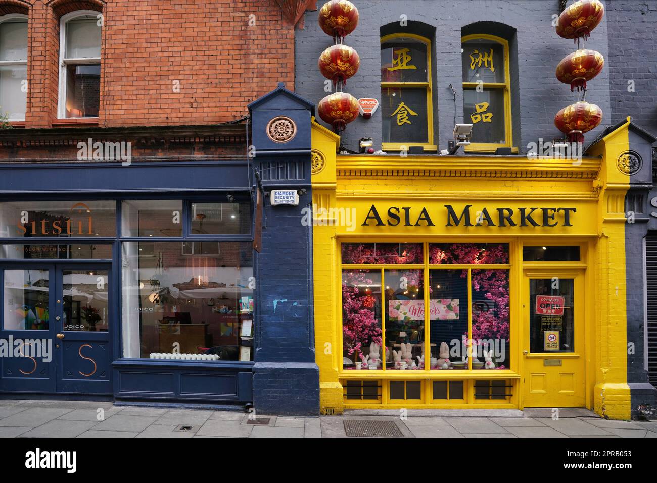 Distinctive main street stores in Dublin Stock Photo - Alamy