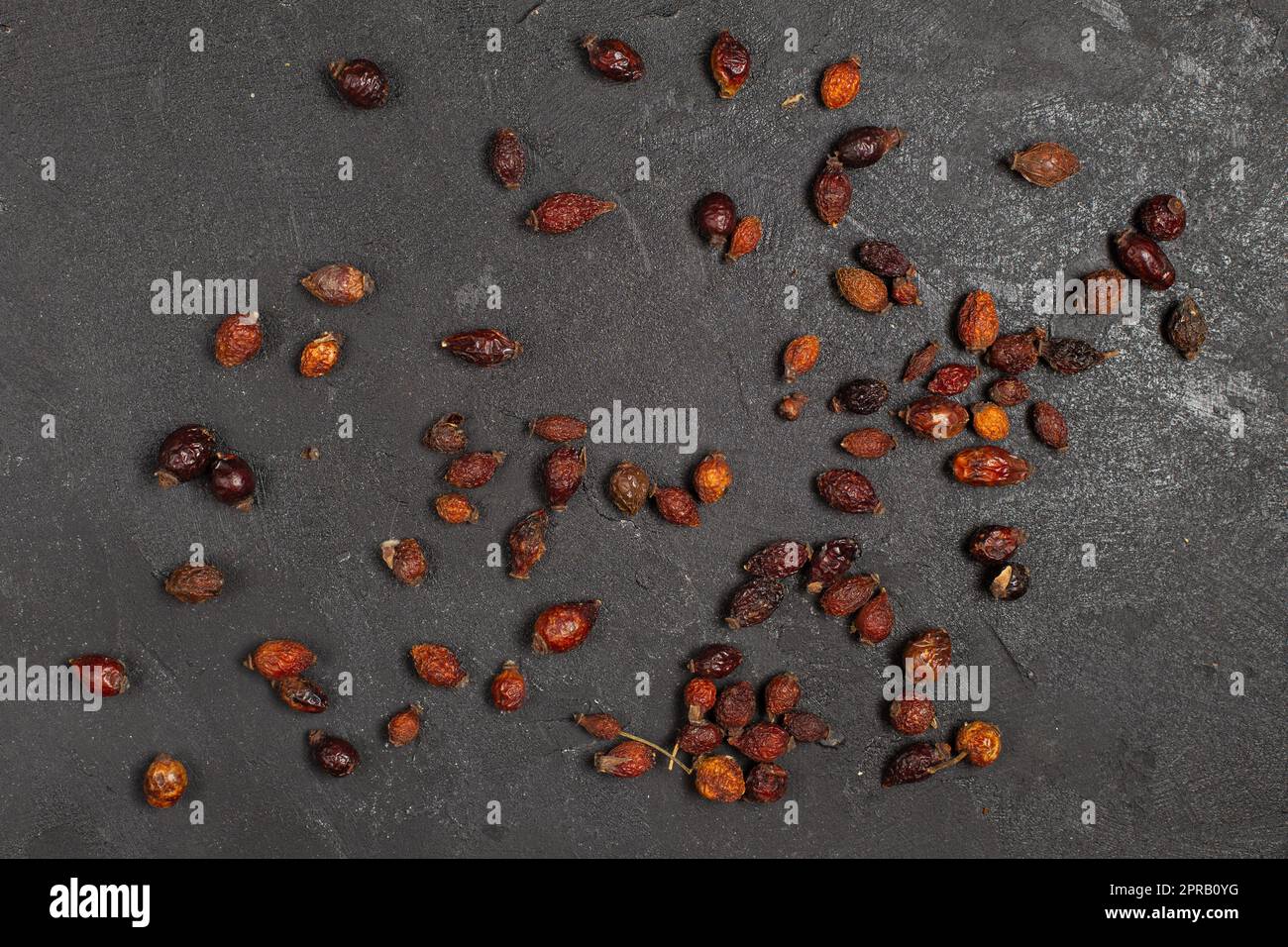 top view dried brown fruits isolated on the dark background fruit dry ...