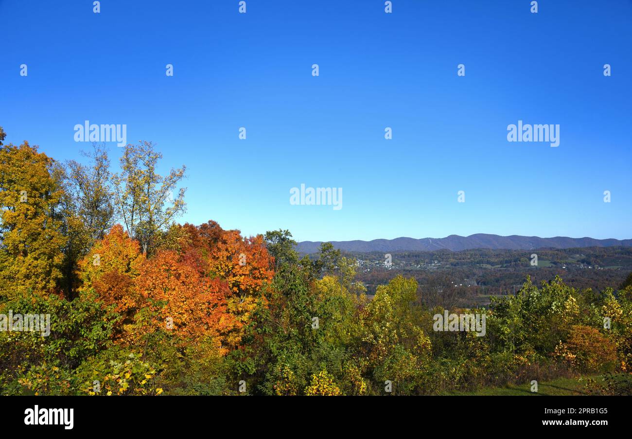 Mountain view of the city of Kingsport, Tennessee. Sky is blue, and ...