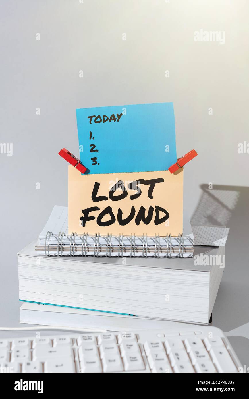 Hand writing sign Lost Found. Word Written on Things that are left ...