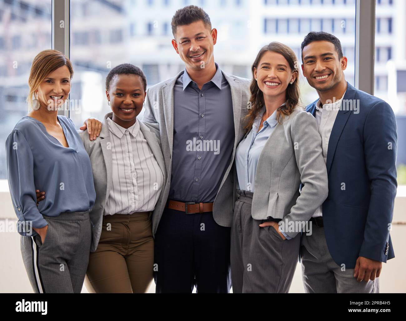 Diverse group standing looking natural hi-res stock photography and ...