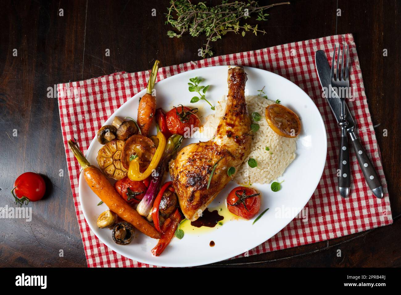 Rustic fried chicken legs with assorted vegetables and rice Stock Photo ...