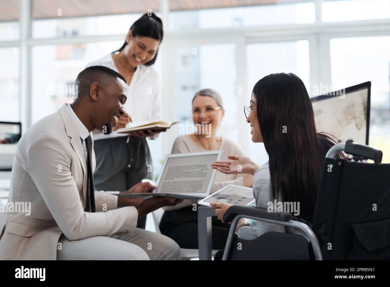 The ideas are flowing. a group of diverse businesspeople having an ...