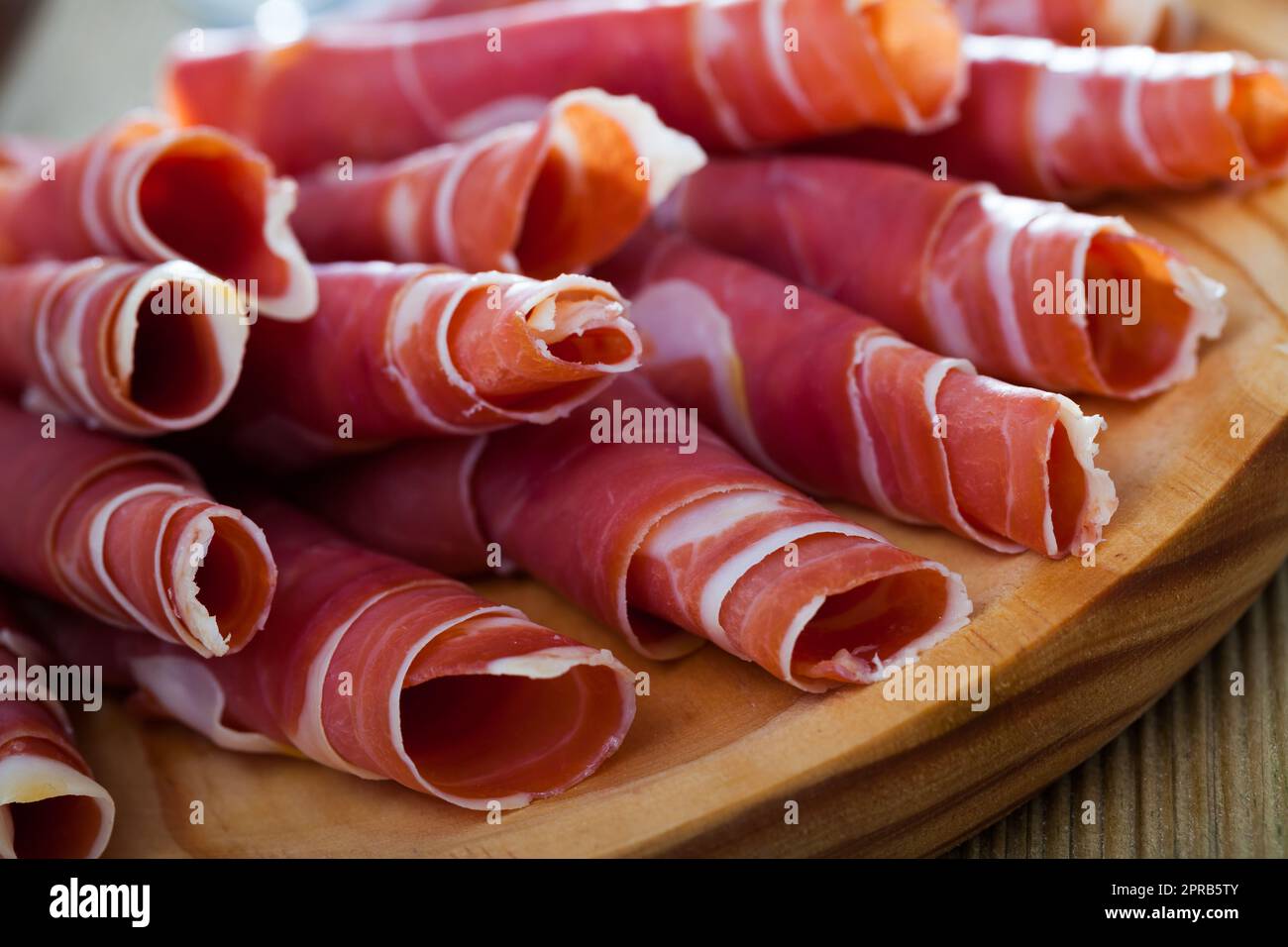 Slices prosciutto rolled up hi-res stock photography and images - Alamy