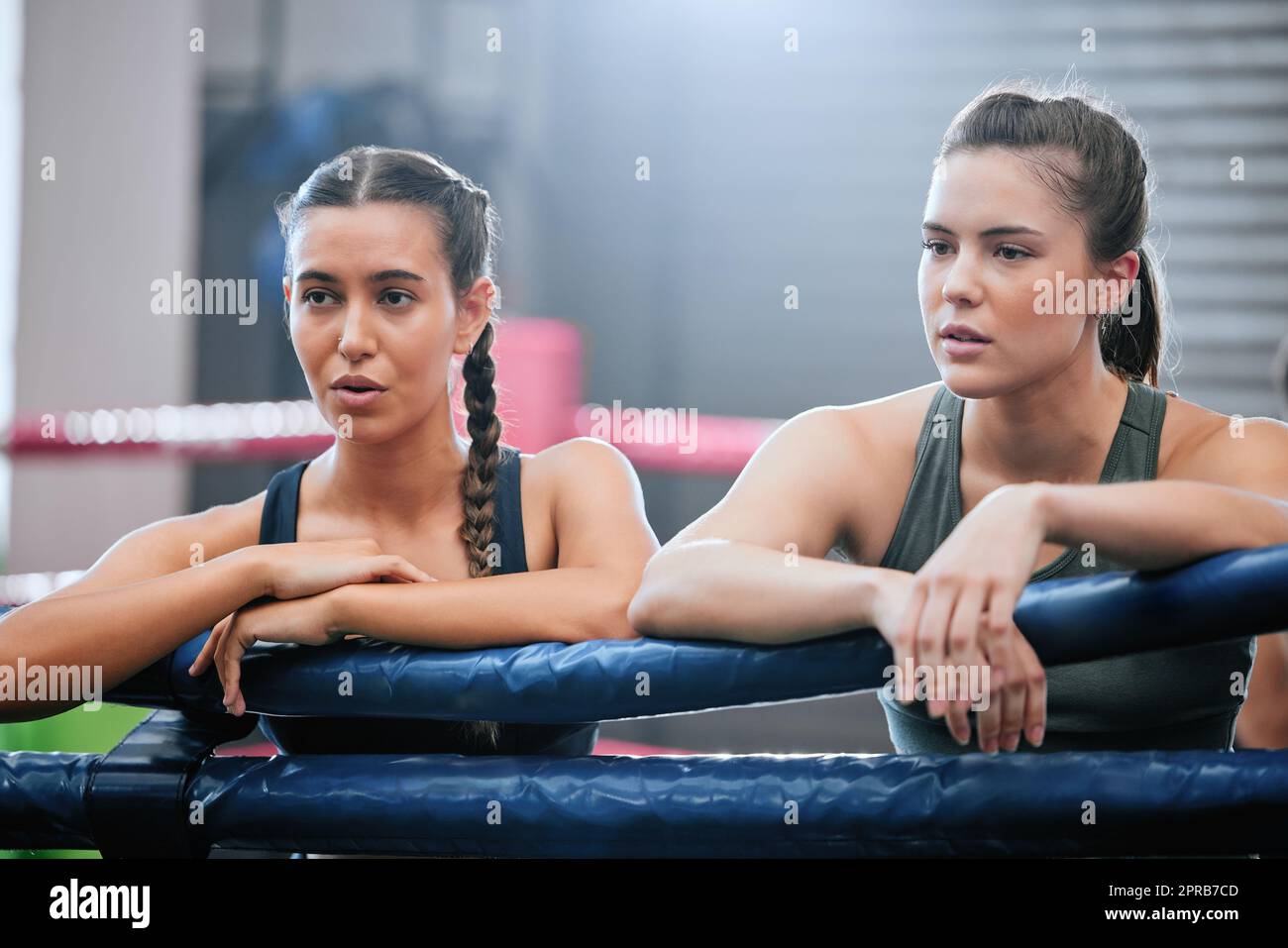 Active, fit and tired boxing female athletes and friends breathing ...