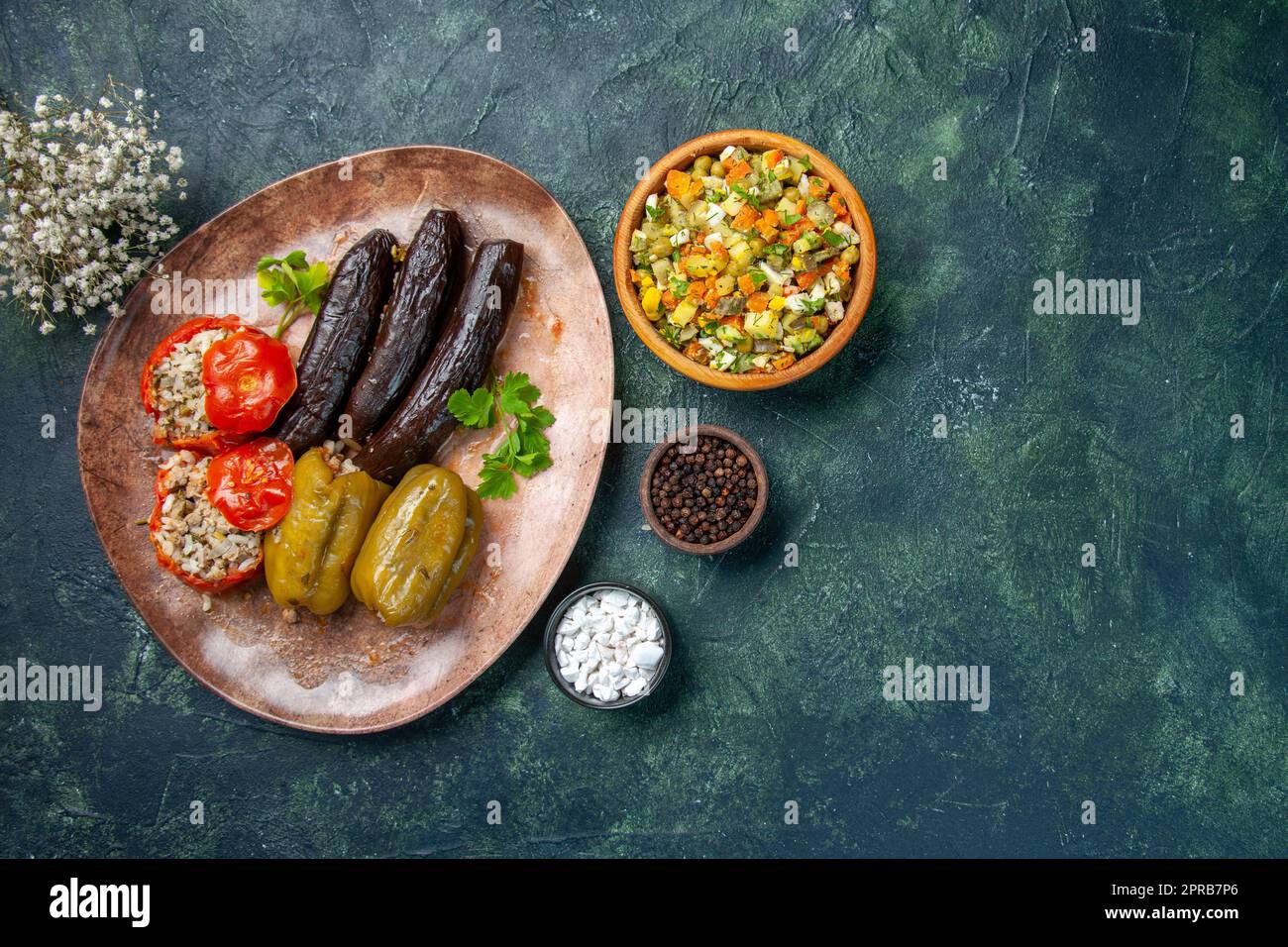 top view delicious vegetable dolma meal filled with ground meat on blue ...