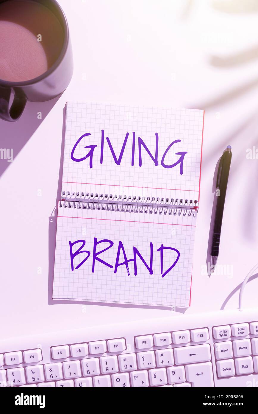 Handwriting text Giving Brand. Concept meaning The process of giving a Name to a company ...