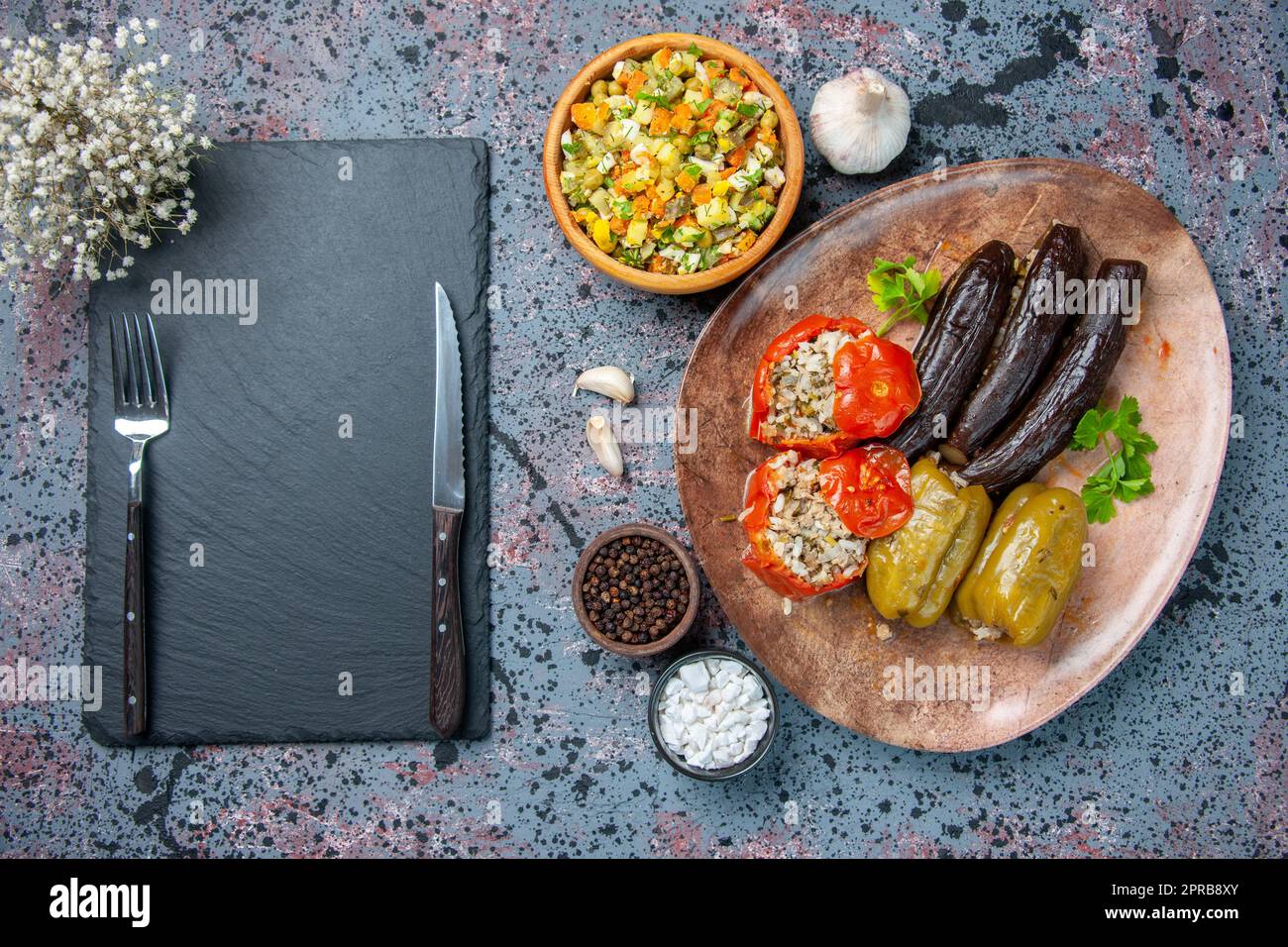 top view delicious vegetable dolma meal filled with ground meat on blue ...