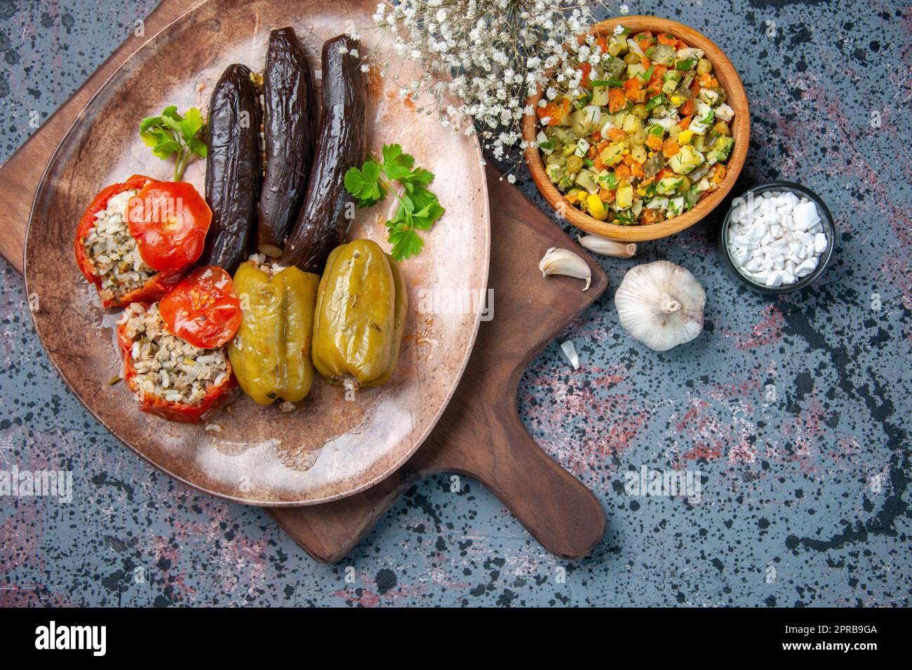 top view delicious vegetable dolma with salad on blue background food ...